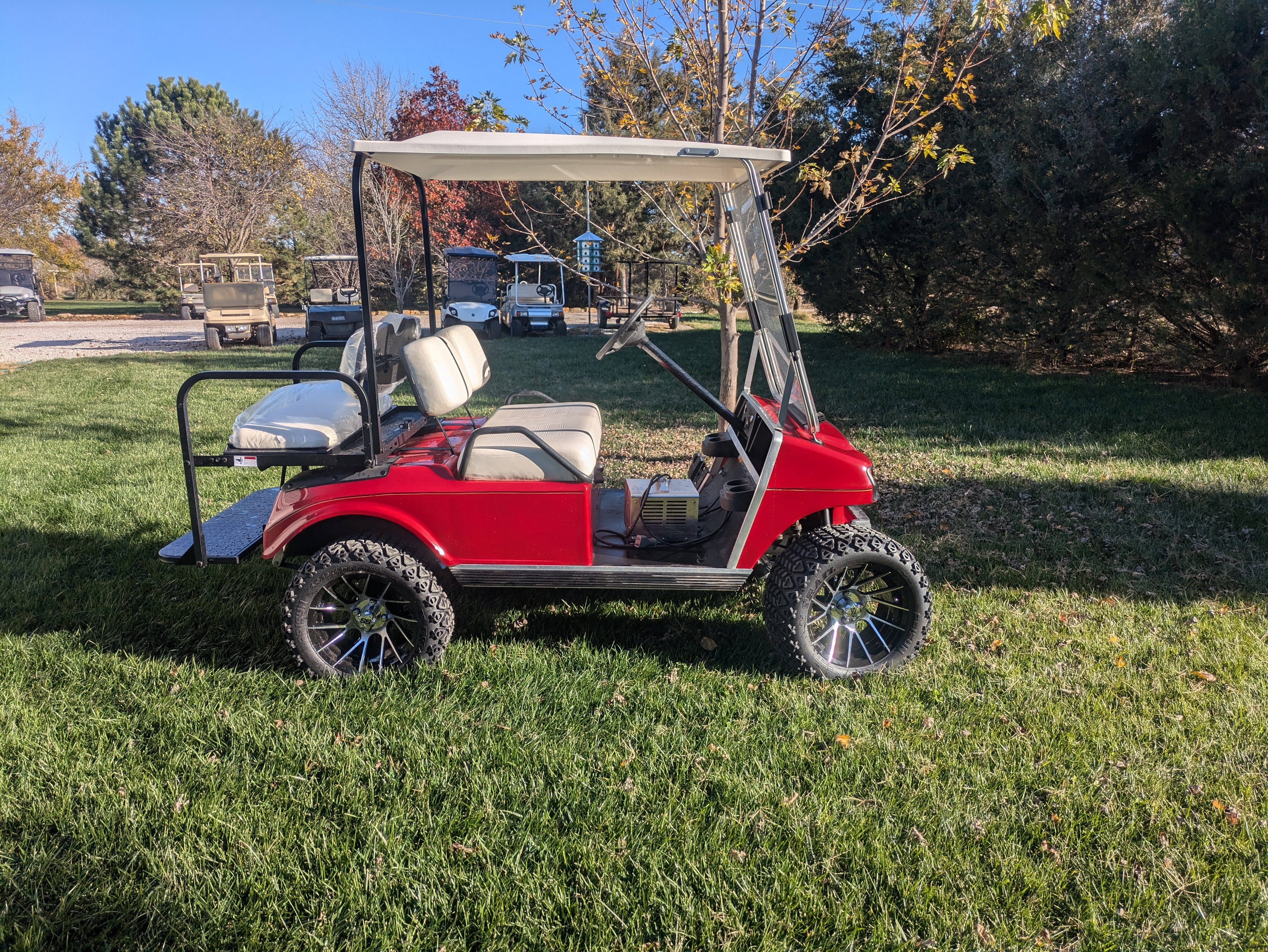 1994 Club Car RED DS 48volt with lights flip seat lifted 6" with new w ...